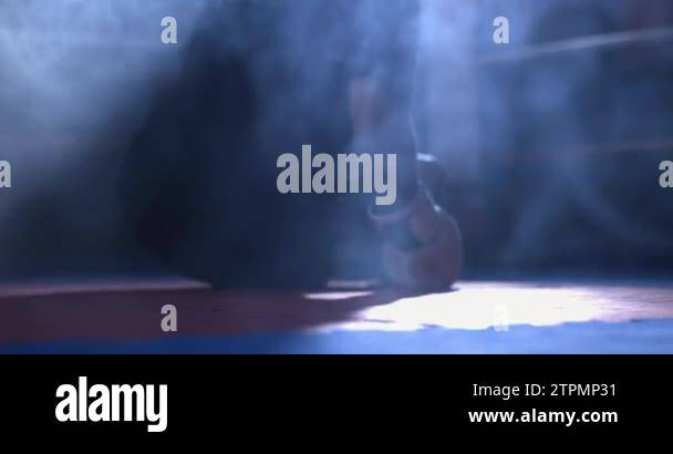 Boxer getting up from floor after being kicked to the ground during ...