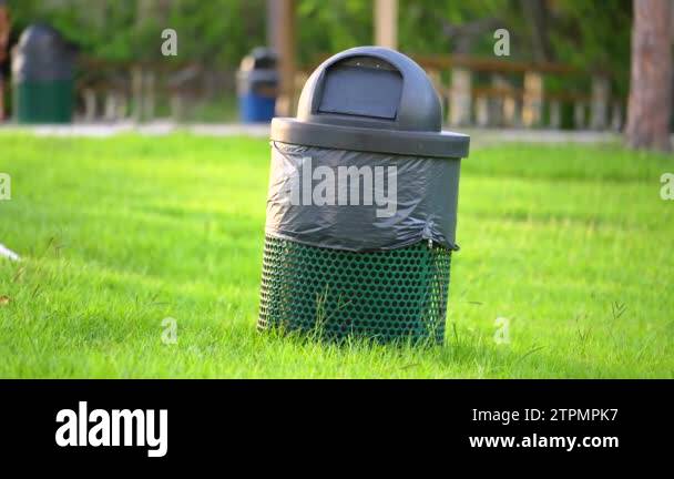 Green litter bin in the park Stock Videos & Footage - HD and 4K Video ...