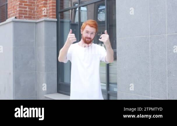 Inviting Young Man, Moving Camera toward Man w/ Beard and Red Hairs ...