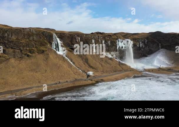 Iceland. Nature. Winter frozen waterfall. Famous waterfall. Frozen ...