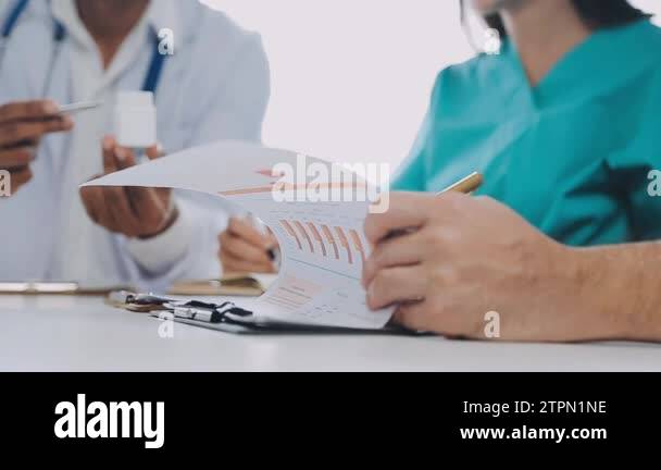Female nurse writing notes clinic Stock Videos & Footage - HD and 4K ...