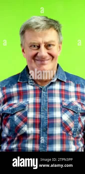 Positive caucasian man looking at camera nodding head answering yes ...