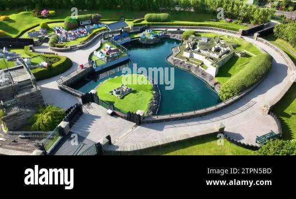 Aerial. Circular. Magnificent park with miniature towns and a working ...