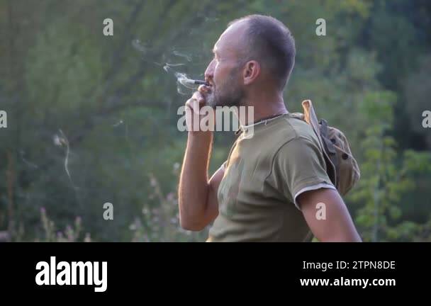 Man in puff of smoke Stock Videos & Footage - HD and 4K Video Clips - Alamy