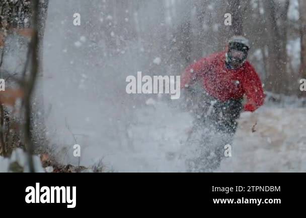 SLOW MOTION, DOF, CLOSE UP: MTB rider racing and drifting down the ...