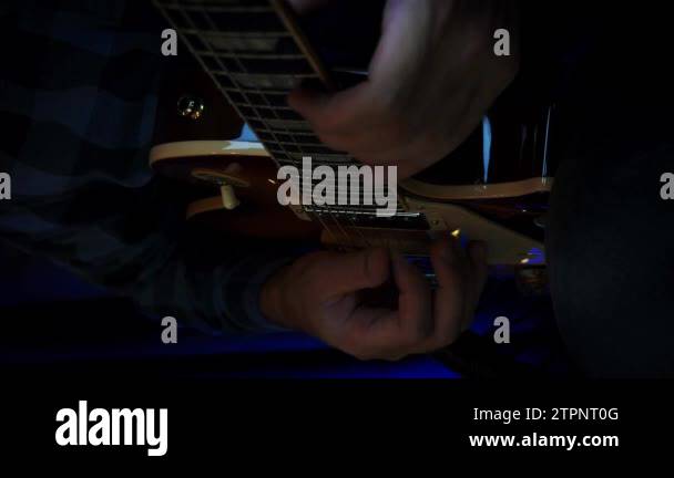 Guitar player hands playing electric or acoustic guitar with fingers ...