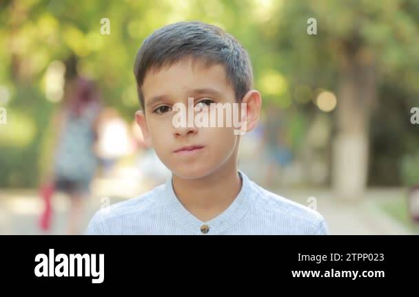 boy eating potato chips on the street. Teen boy eating junk food Stock ...