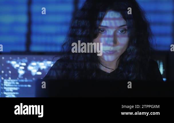 Woman Hacker Programmer With Curly Hair Is Working On Computer In Cyber Security Center Filled