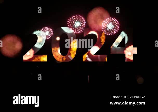 4K. loop seamless of firework of year 2024 greeting during new year eve ...