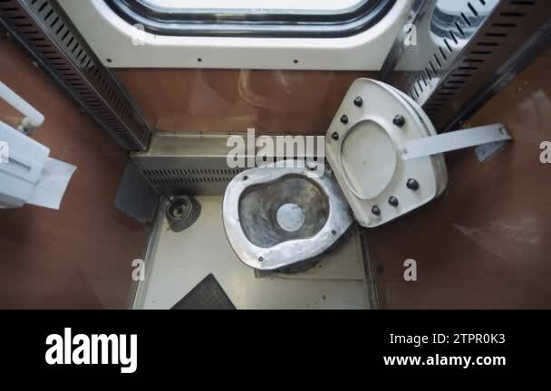 Train toilet. Dirty toilet room in a moving train cabin Stock Video ...