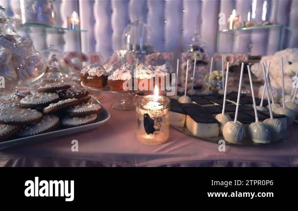 Candy bar in the restaurant, childrens party, birthday, lighted candle ...