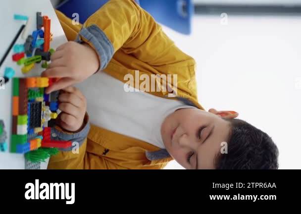 Robotics programming class. Children construct and code Robot. STEM ...