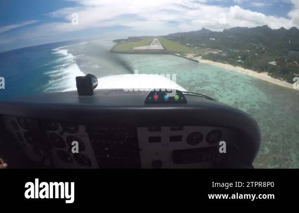 Flying cessna plane cockpit during landing in Rarotonga Cook Islands ...