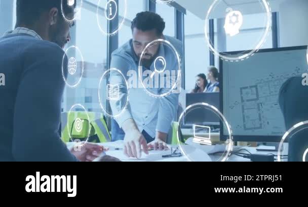 Animation of icon in circles over diverse architects discussing about ...