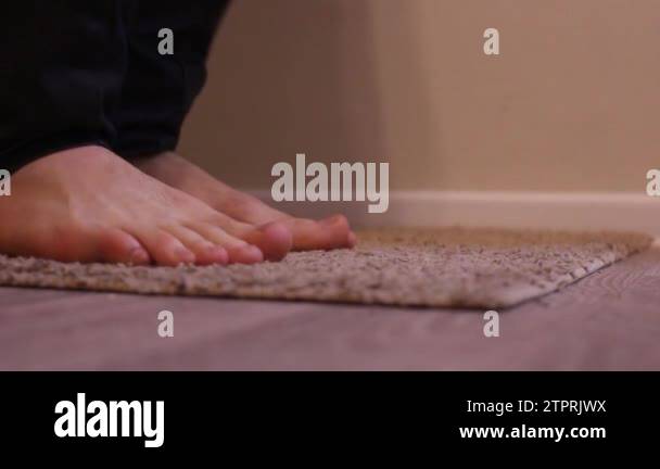 Man Jumping on the Carpet With Bare Feet, and Wiggle Your Toes Stock ...