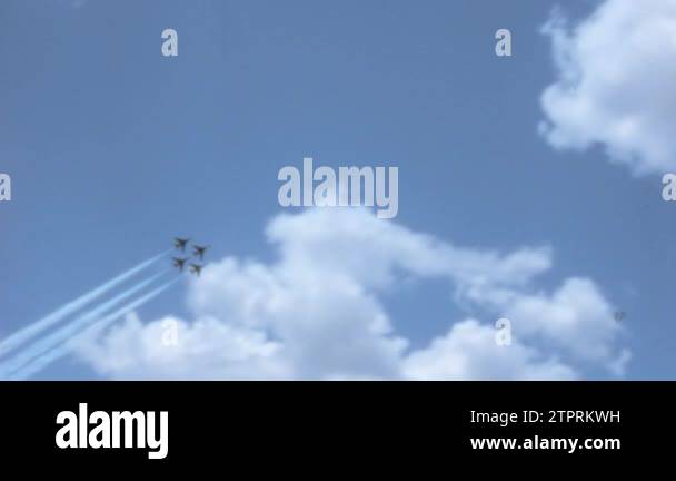 Four Fighter Jet Aircraft Fly in a Diamond Formation and Perform a Roll ...