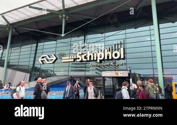 Amsterdam Schiphol Airport building main entrance, signage on the front ...