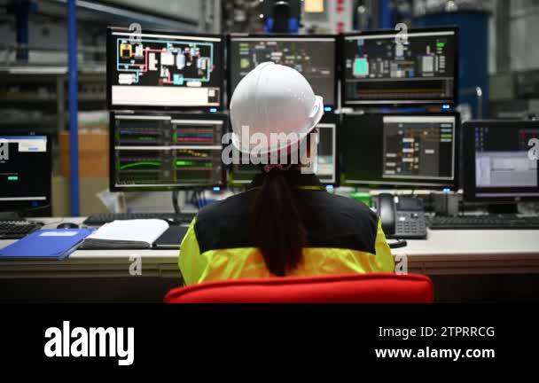 Engineer working at control room. Manager control system. Technician ...