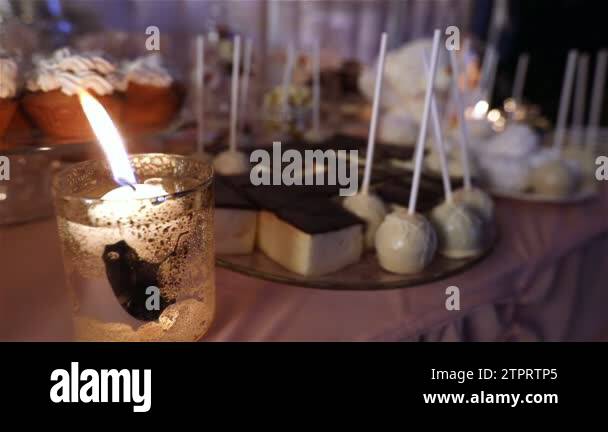 Candy bar in the restaurant, childrens party, birthday, lighted candle ...