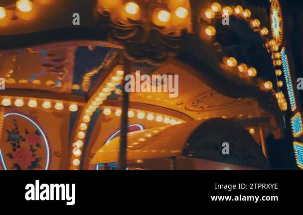 A carousel or carrousel, merry-go-round, roundabout, or hurdy-gurdy is ...