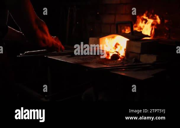 Hardening of the metal by sharp cooling in water. There is steam. The ...