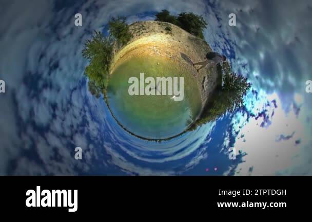 Little Tiny Planet 360 Degree Man at the Sea Turquoise Water Sea Backpacker is Looking at the ...