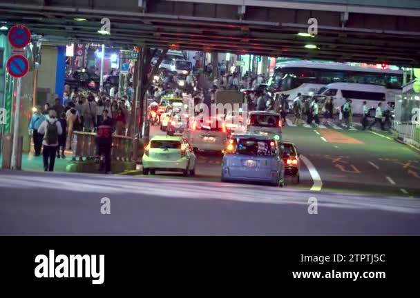 Traffic crosses the famous intersection in Shibuya, Tokyo, Japan Stock ...