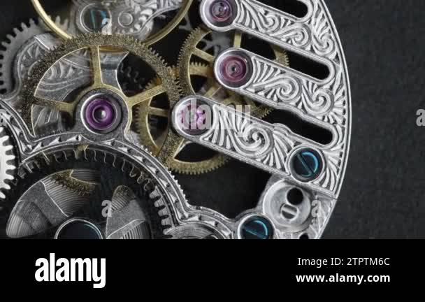 Silver chain and internal working mechanism of an antique pocket watch ...