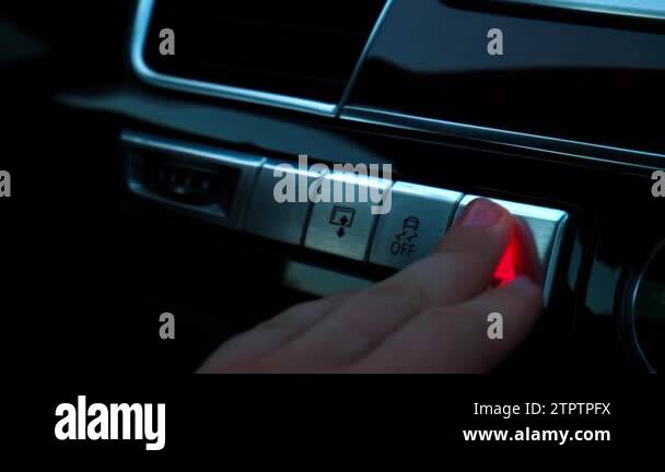 Red emergency button flashing Interior of modern luxury car. Details of ...