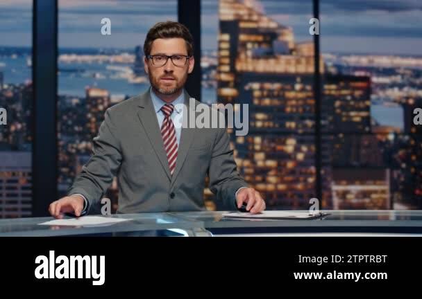 Serious newsreader speaking newscast evening television studio closeup ...