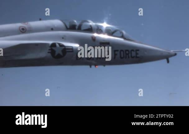 Exclusive footage of 1960s USAF fighters in formation. Side view from ...