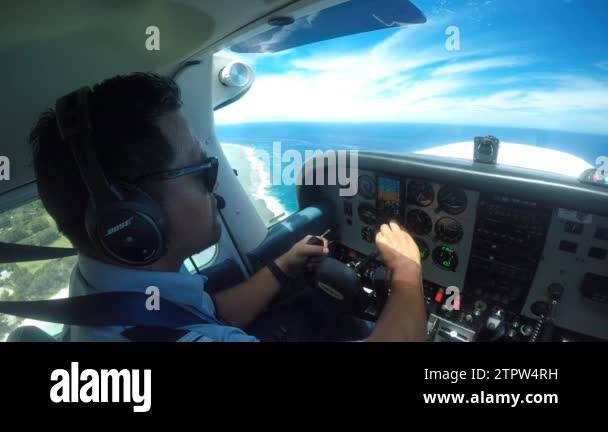 Air Rarotonga pilot fly Cessna 172 Skyhawk on a scenic flight above ...