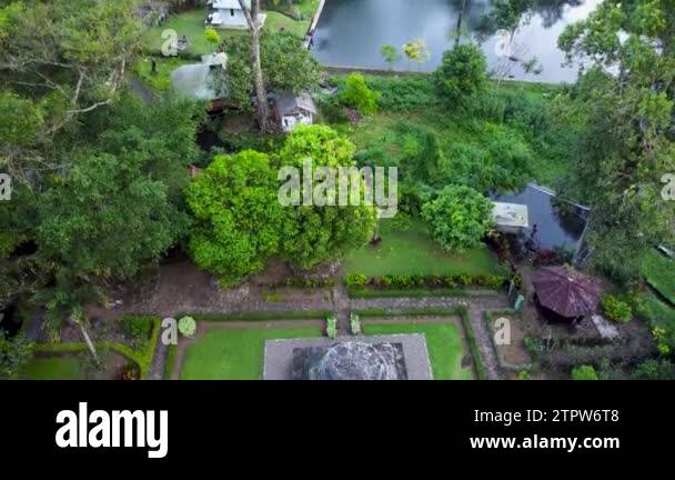 The appearance of Sumberawan Temple from above shows a very green ...