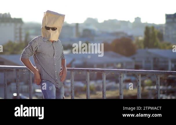 Paper bag head man Stock Videos & Footage - HD and 4K Video Clips - Alamy