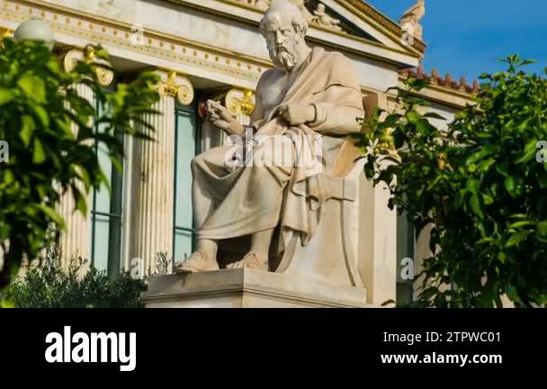Statue of the great Greek philosopher Plato sitting on a marble chair ...