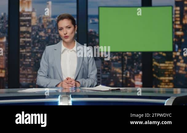Anchorwoman broadcasting greenscreen display studio closeup. Beautiful ...