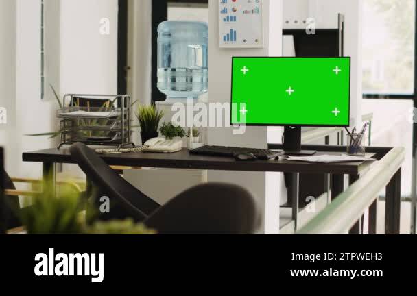 Empty Workstation With Greenscreen Running On Computer Open Floor Plan