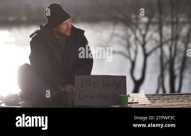 Begging sign Stock Videos & Footage - HD and 4K Video Clips - Alamy