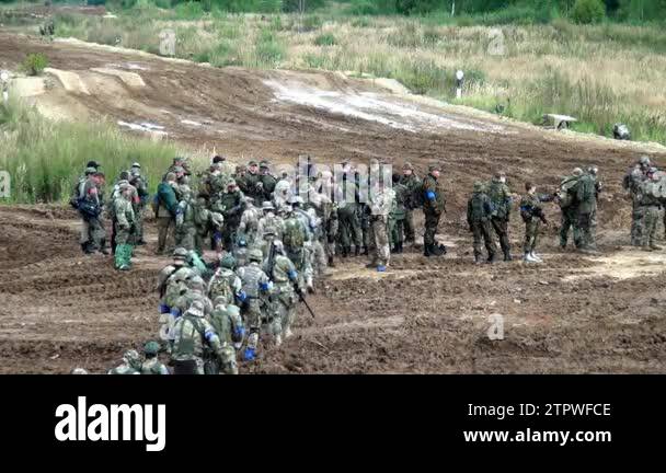 Squad of strikeball team with machine submachine guns Stock Video ...