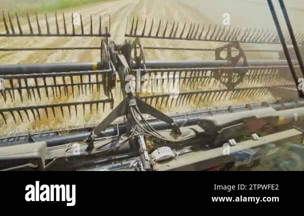 Rotating knives grain harvester. Metal part of combine harvester for ...