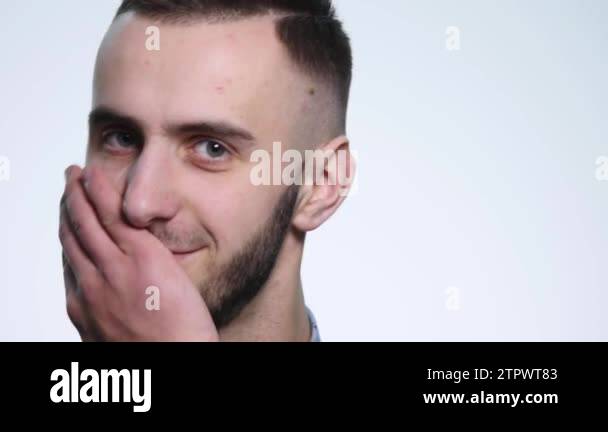 frustrated young man on a white background emotions. Concept of ...