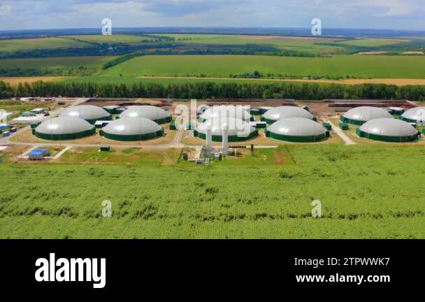 Biogas on field. Storage tanks for biomass production on beautiful ...