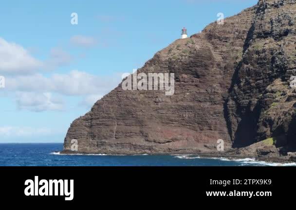 Makapuu Point Lighthouse on Oahu Hawaii tropical island. Scenic aerial ...
