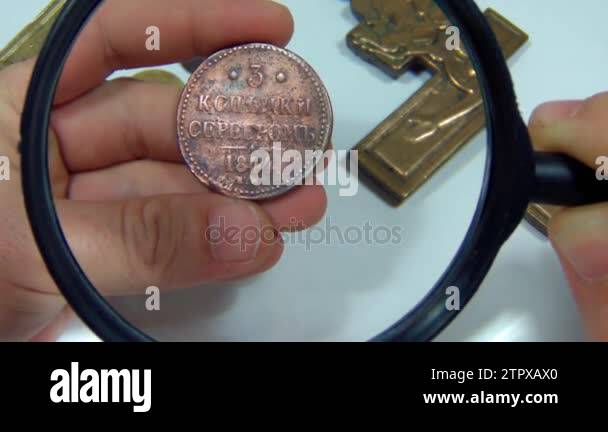 Coin collection with a magnifying glass Stock Videos & Footage - HD and ...