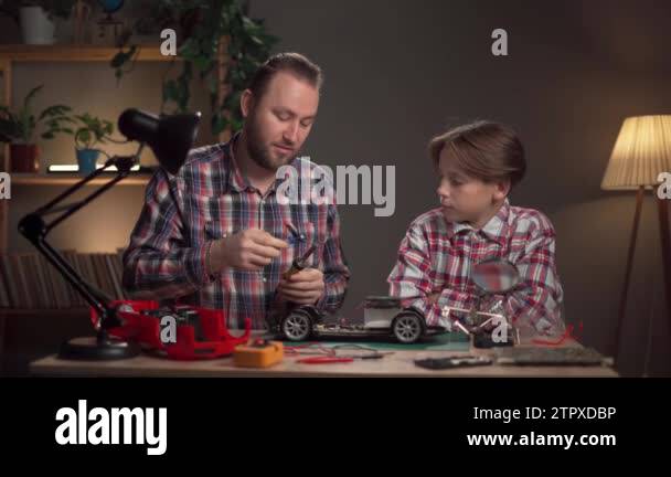 Father fixing toy son Stock Videos & Footage - HD and 4K Video Clips ...