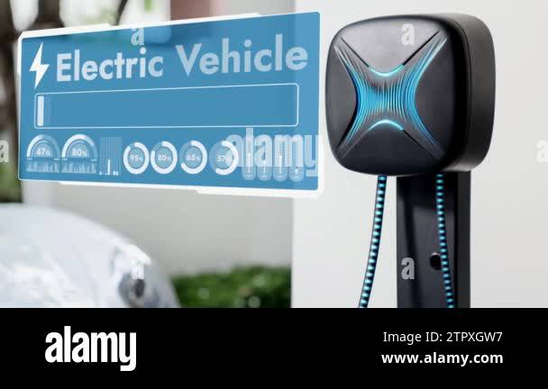 Electric car recharging in futuristic home charging station with smart ...
