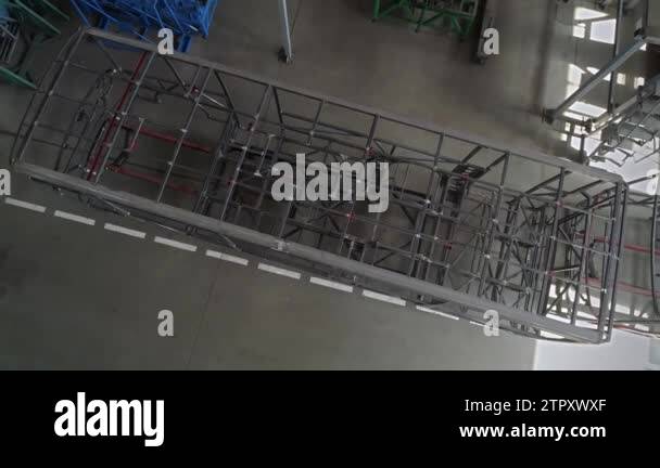 The frame structure of the bus in the assembly shop of the plant. The ...