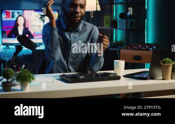 African american content creator filming technology review of newly ...