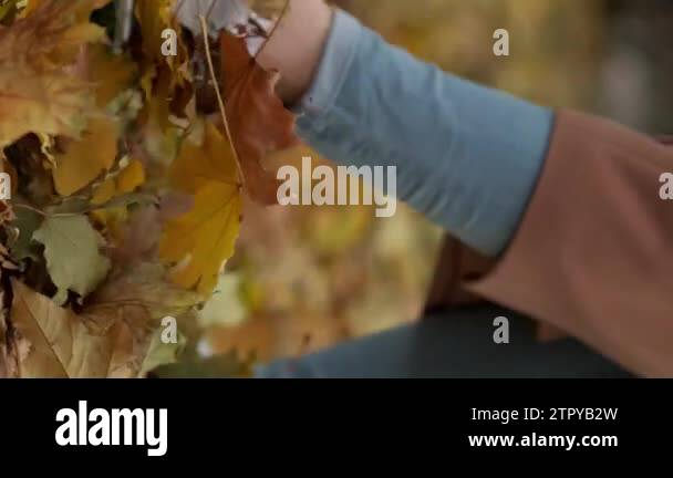 Vertical video. Romantic fall. Walking woman. Enjoying nature ...