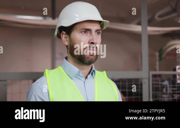 Portrait face male engineer technician standing in technical room of ...